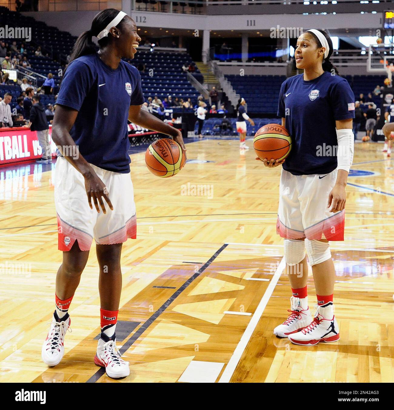USA’s Tina Charles, left, and teammate Maya Moore talk to one another ...