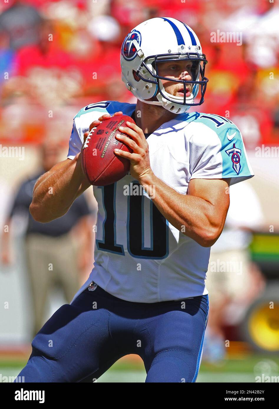 Tennessee Titans Jake Locker (10) drops back to pass during an NFL game ...