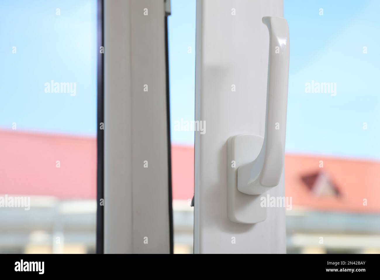 Closeup view of modern white plastic window Stock Photo - Alamy