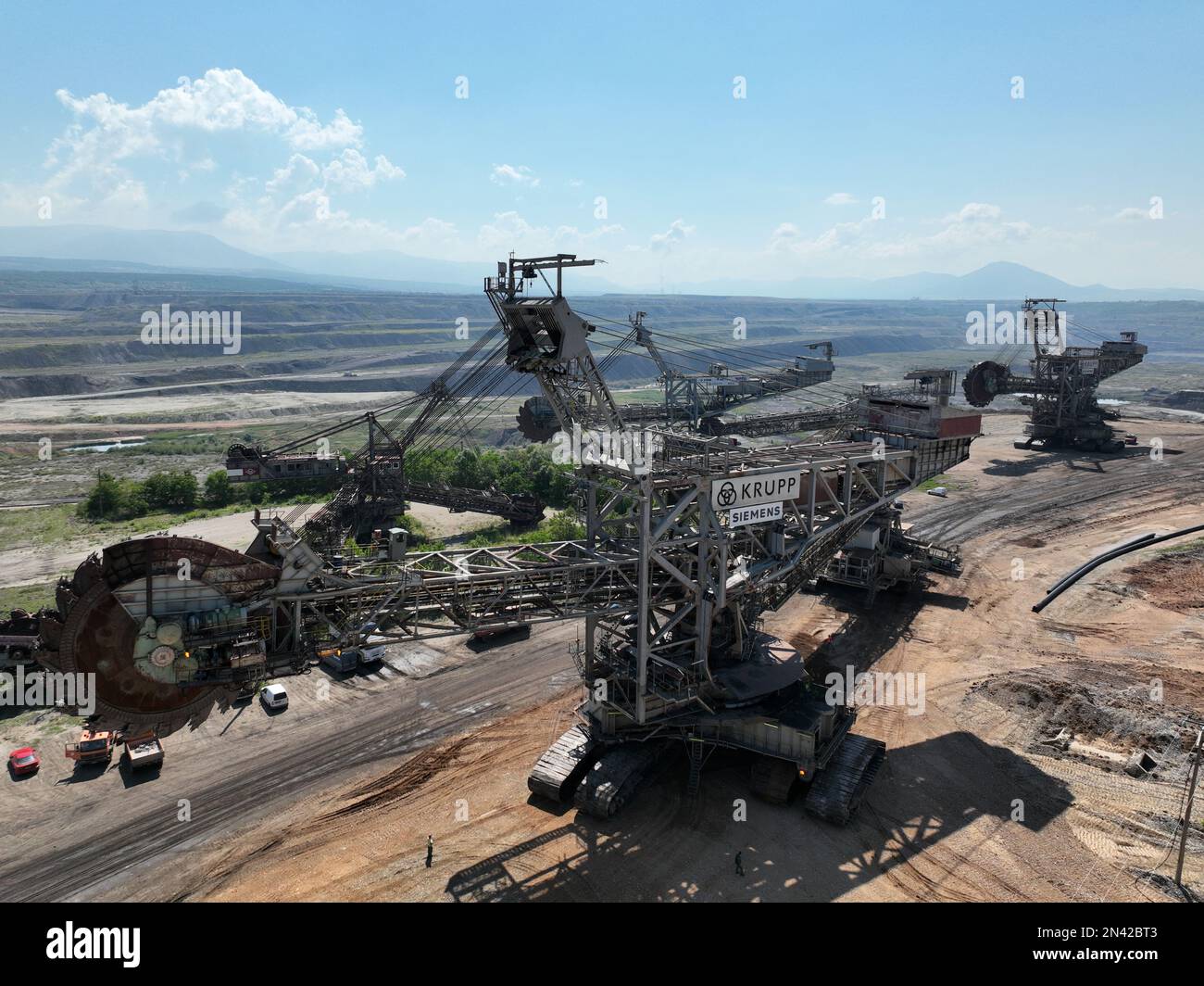 Huge bucket wheel at a coal surface mine. Huge excavator on open pit ...