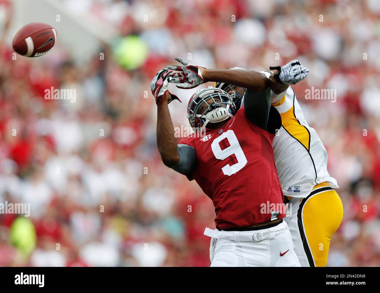 Alabama wide receiver Amari Cooper (9) misses a catch against Southern ...