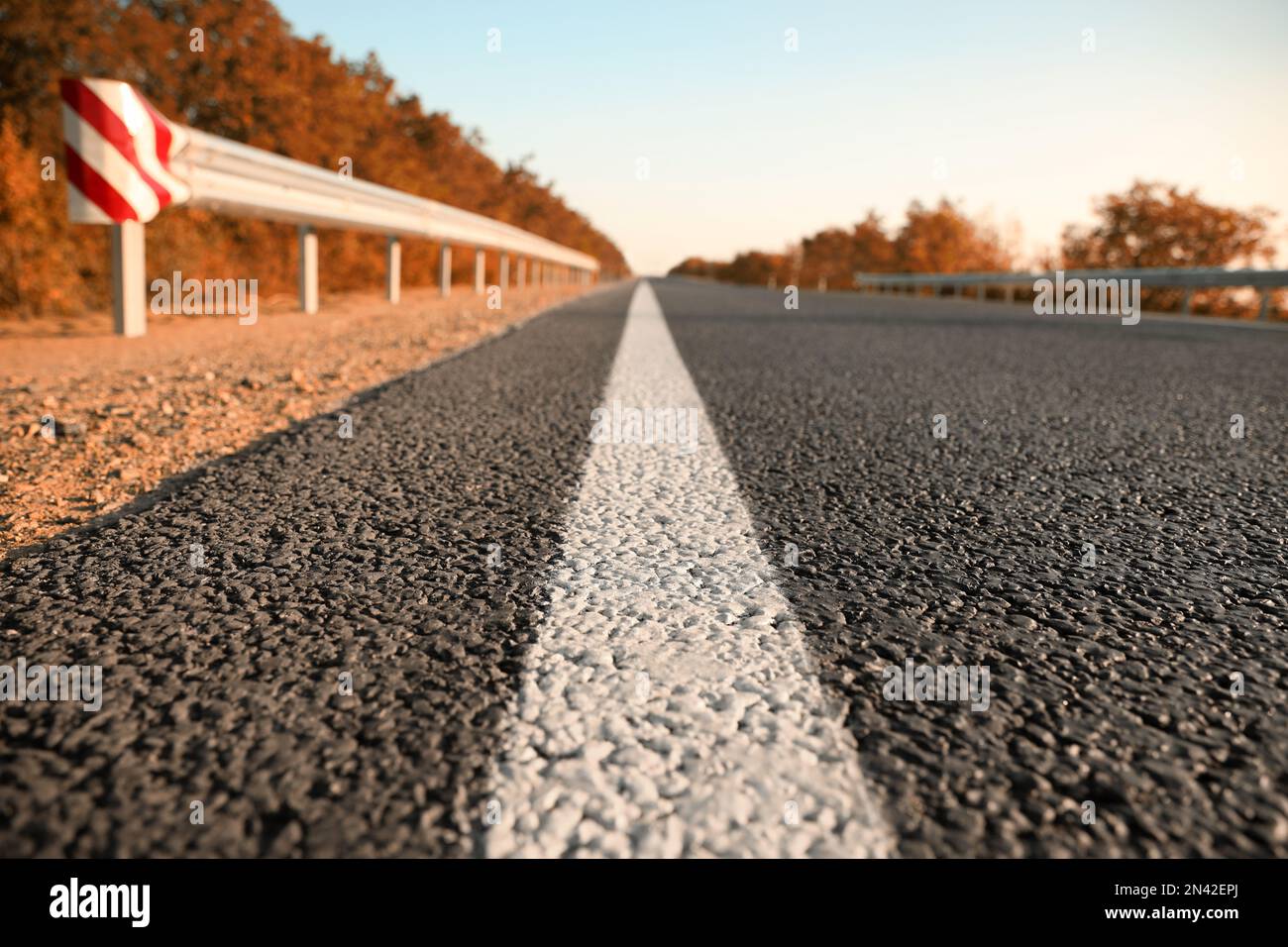 Beautiful view of empty asphalt highway. Road trip Stock Photo - Alamy