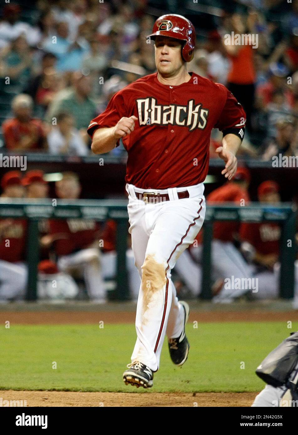 Arizona Diamondbacks' Aaron Hill scores a run in the eighth inning ...