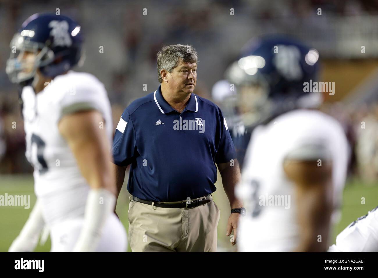 Rice head coach David Bailiff watches his team before an NCAA college ...