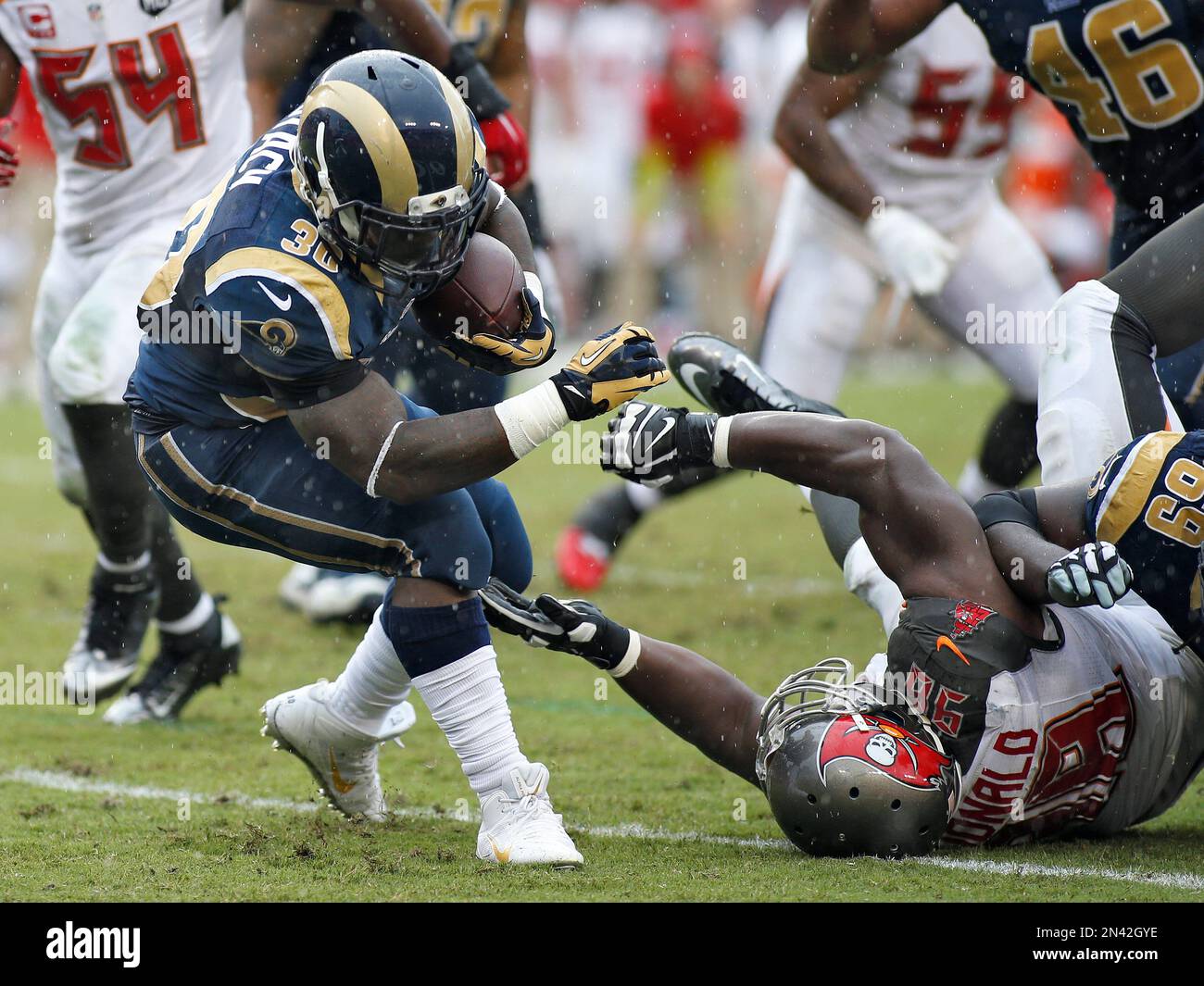St. Louis Rams running back Zac Stacy (30) is stopped by Tampa Bay ...