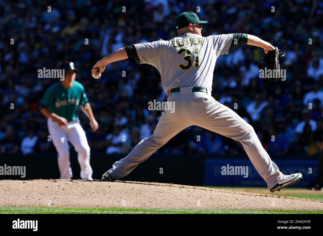 Oakland Athletics starting pitcher Jon Lester throws against the ...