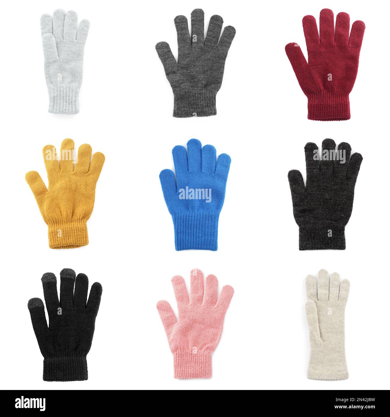 Set of woolen gloves on white background, top view Stock Photo - Alamy