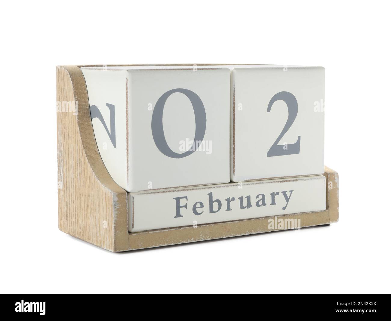 Wooden block calendar with date February 2nd on white background ...