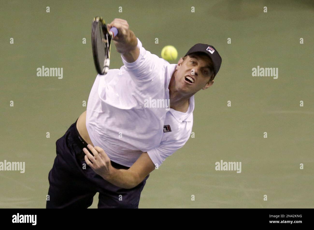 Sam Querrey, of the United States, serves to Norbert Gombos, of ...