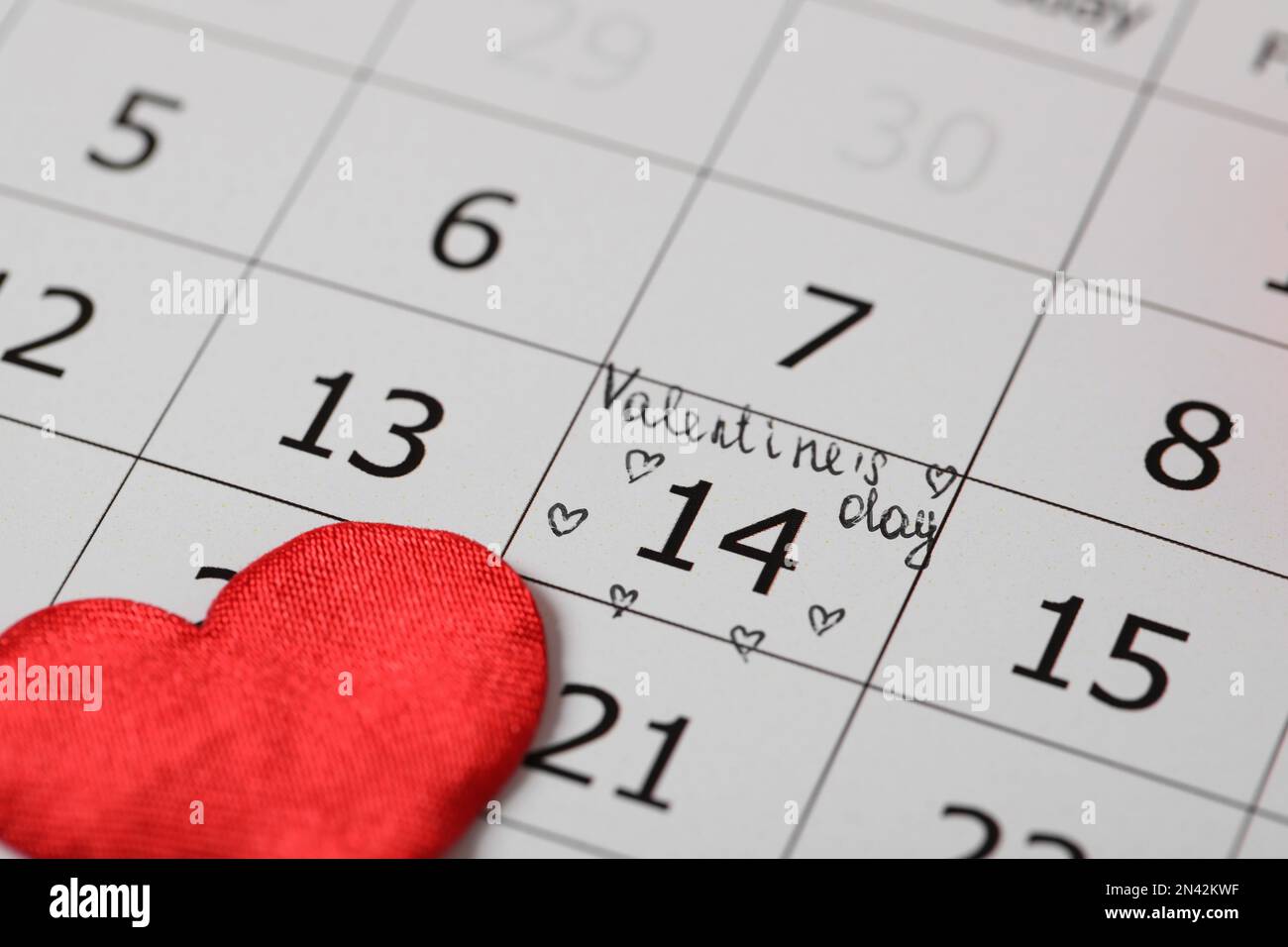 Calendar with marked Valentine's Day and red heart, closeup Stock Photo ...