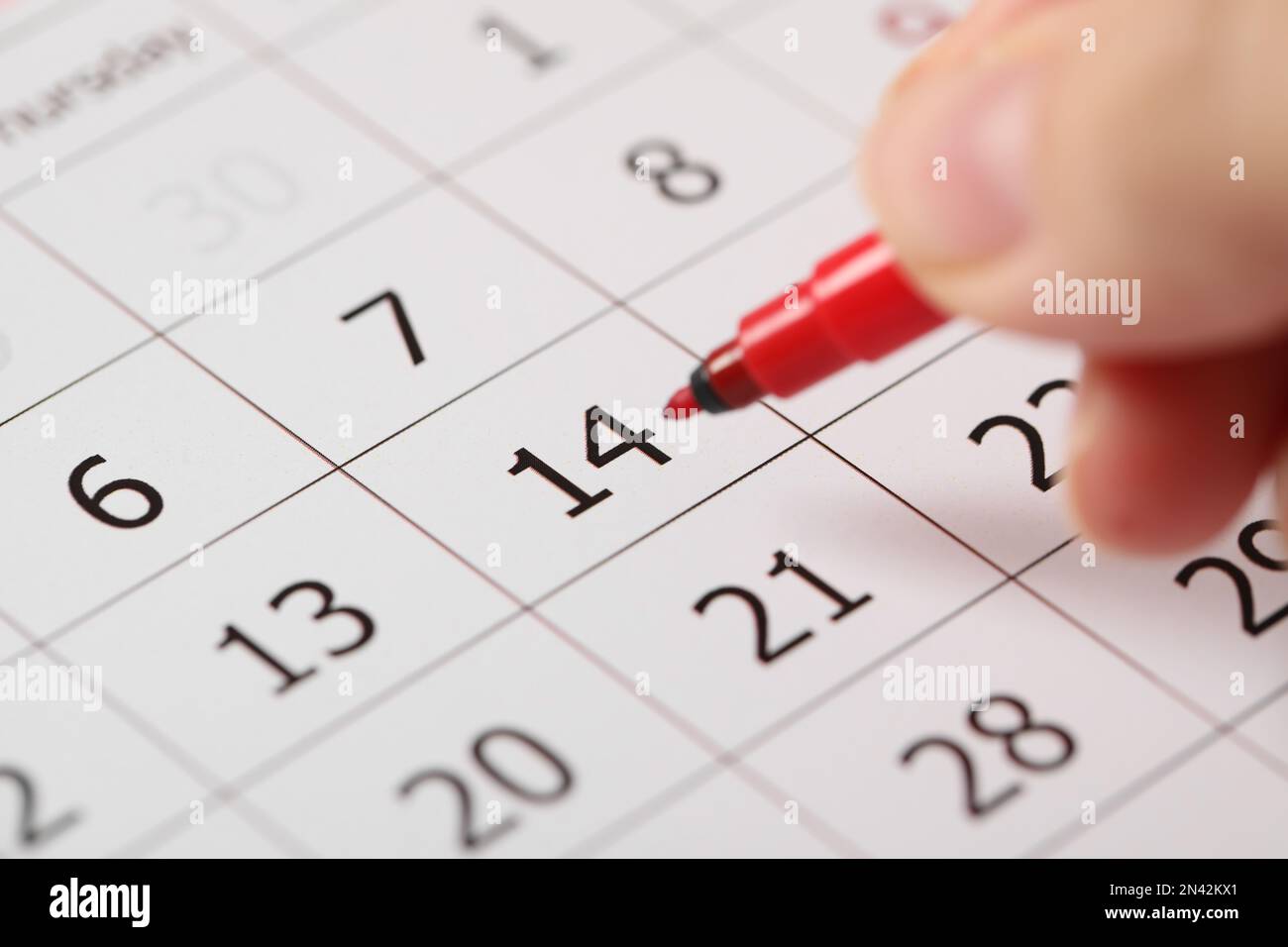Hand marking calendar hi-res stock photography and images - Alamy