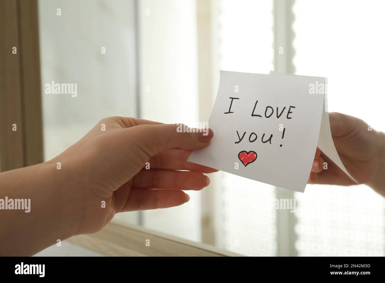 Putting sticky note hi-res stock photography and images - Alamy