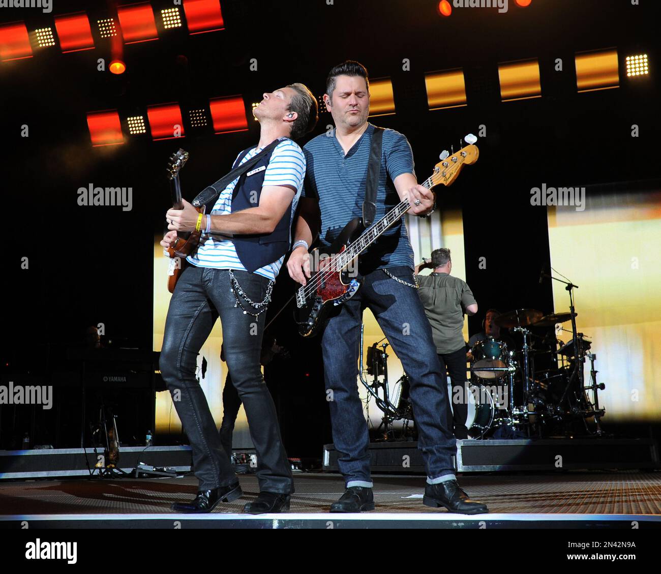 Joe Don Rooney and Jay DeMarcus of Rascal Flatts perform during the ...