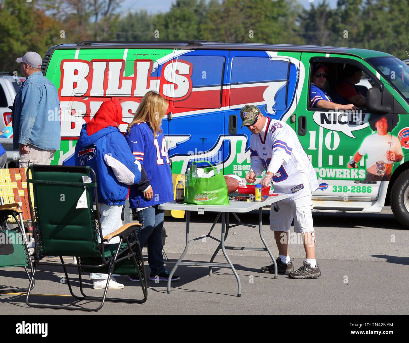 Fans tailgate before an NFL football game between the Buffalo Bills and ...