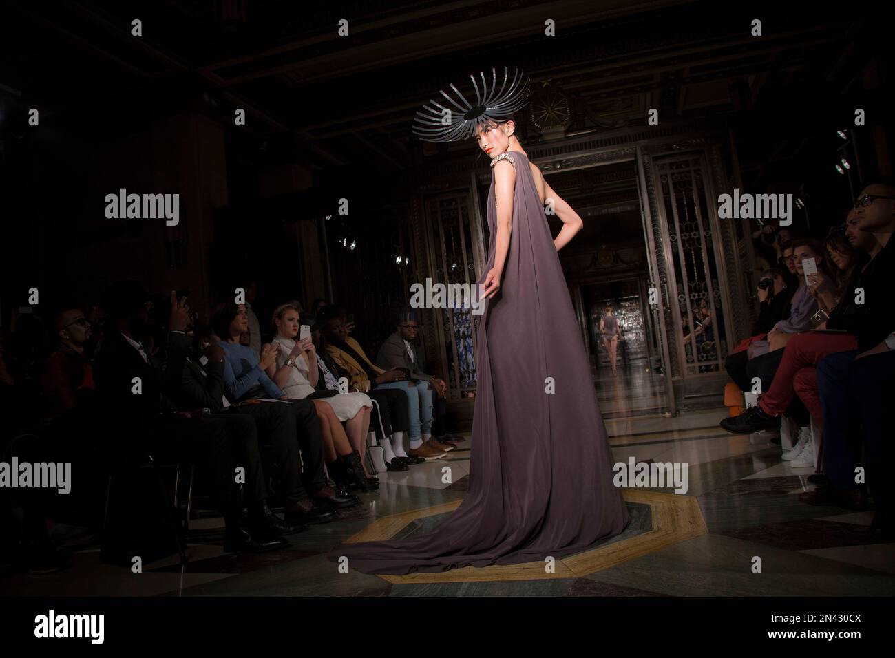 A model wears an outfit by designer Ashley Isham for the Spring/Summer ...