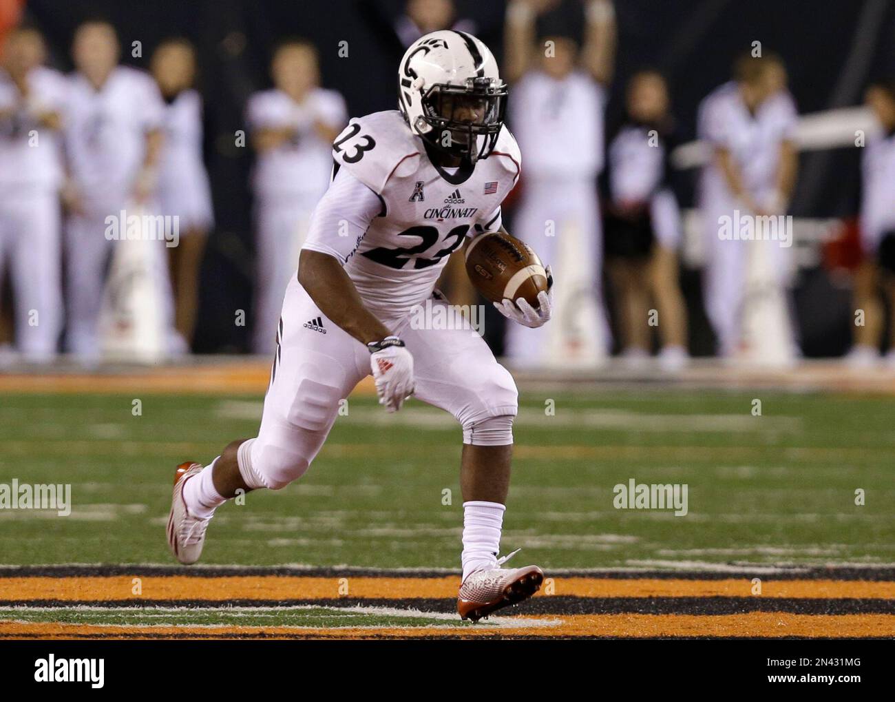 Cincinnati running back Hosey Williams runs against Toledo in the ...