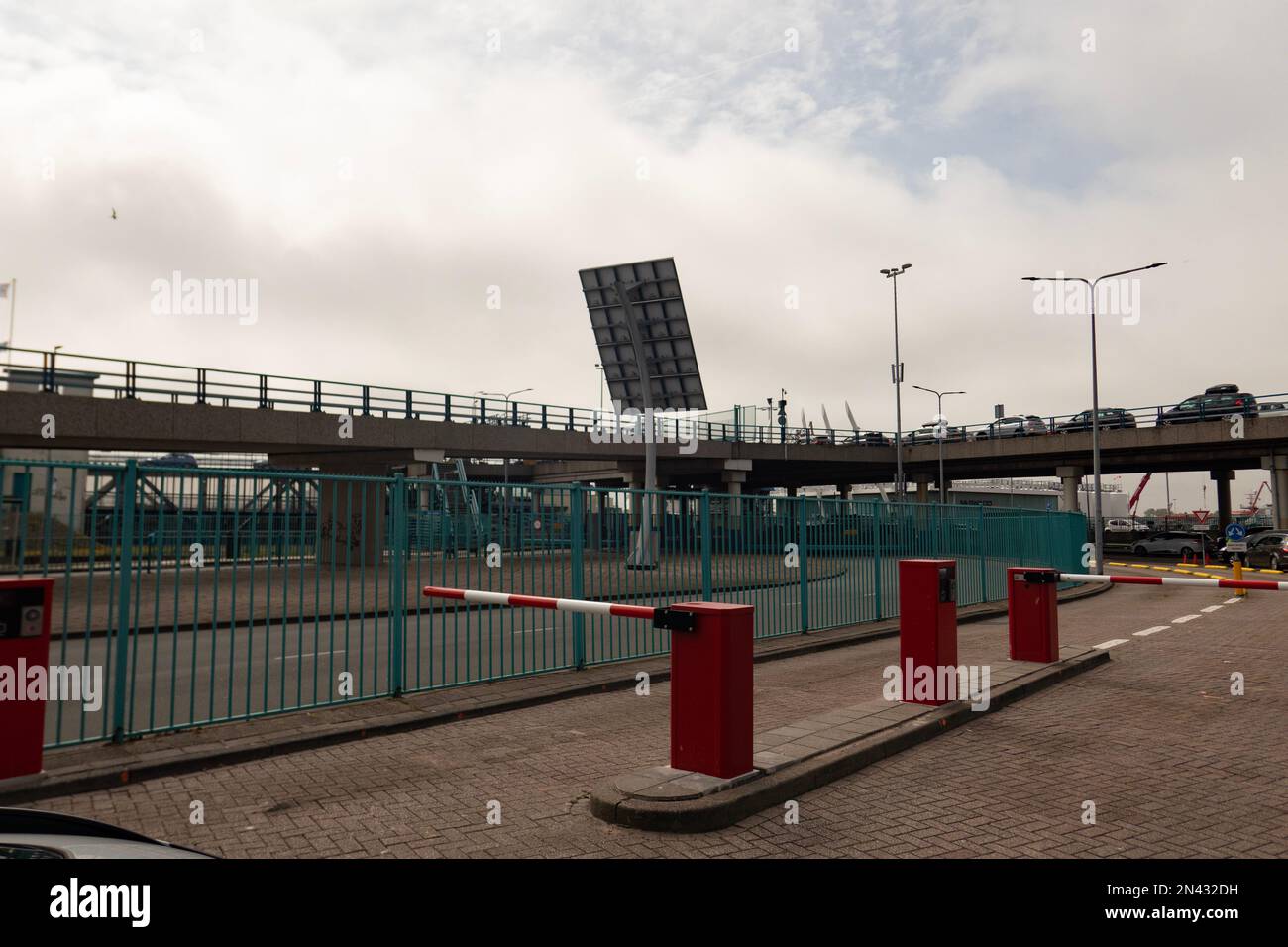 Cars waiting in a queue to get aboard ferry boat in the TESO Ferry Port ...