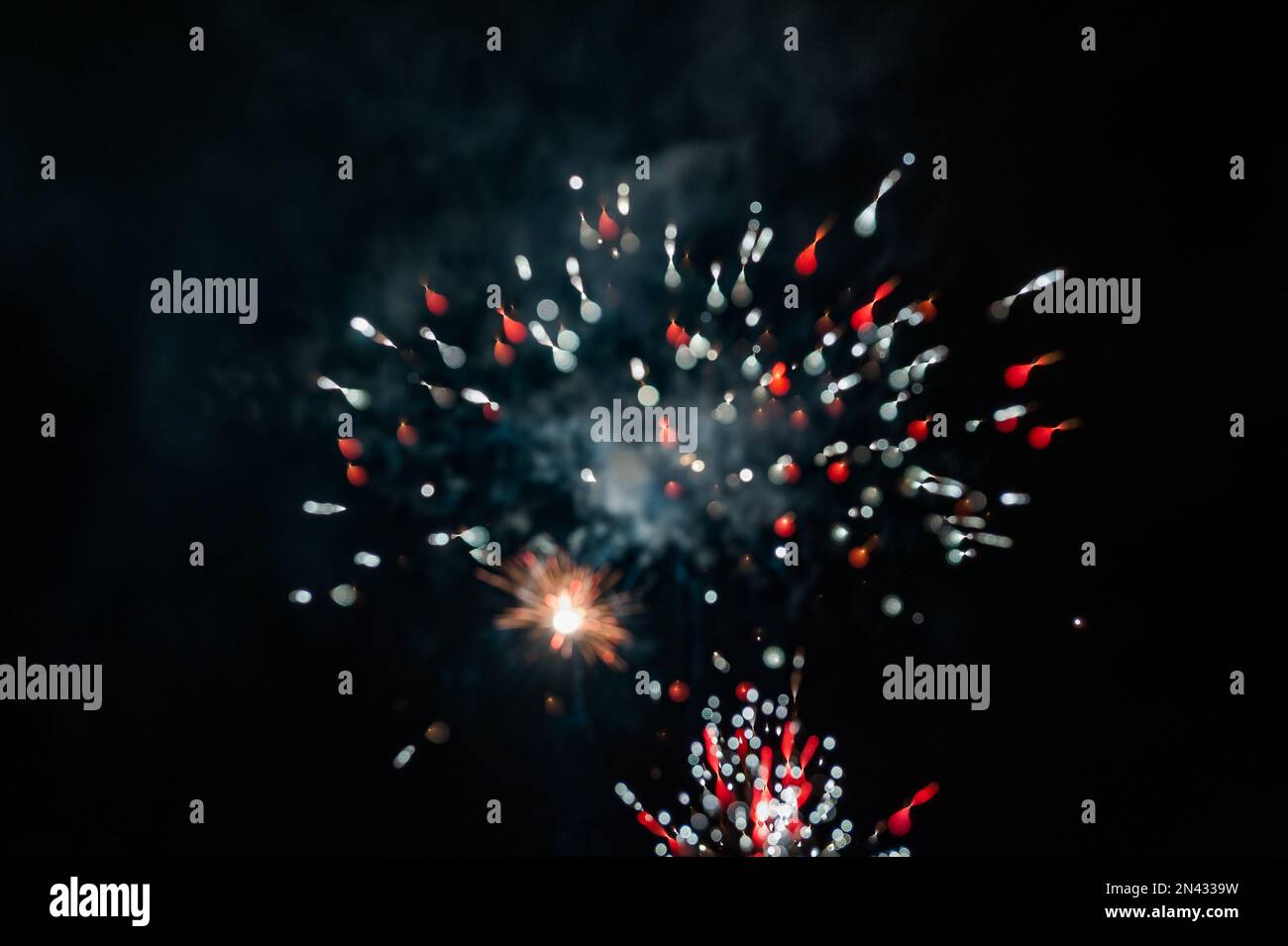 Abstract photo of firework flower. Salute without focus. Blurry photo ...