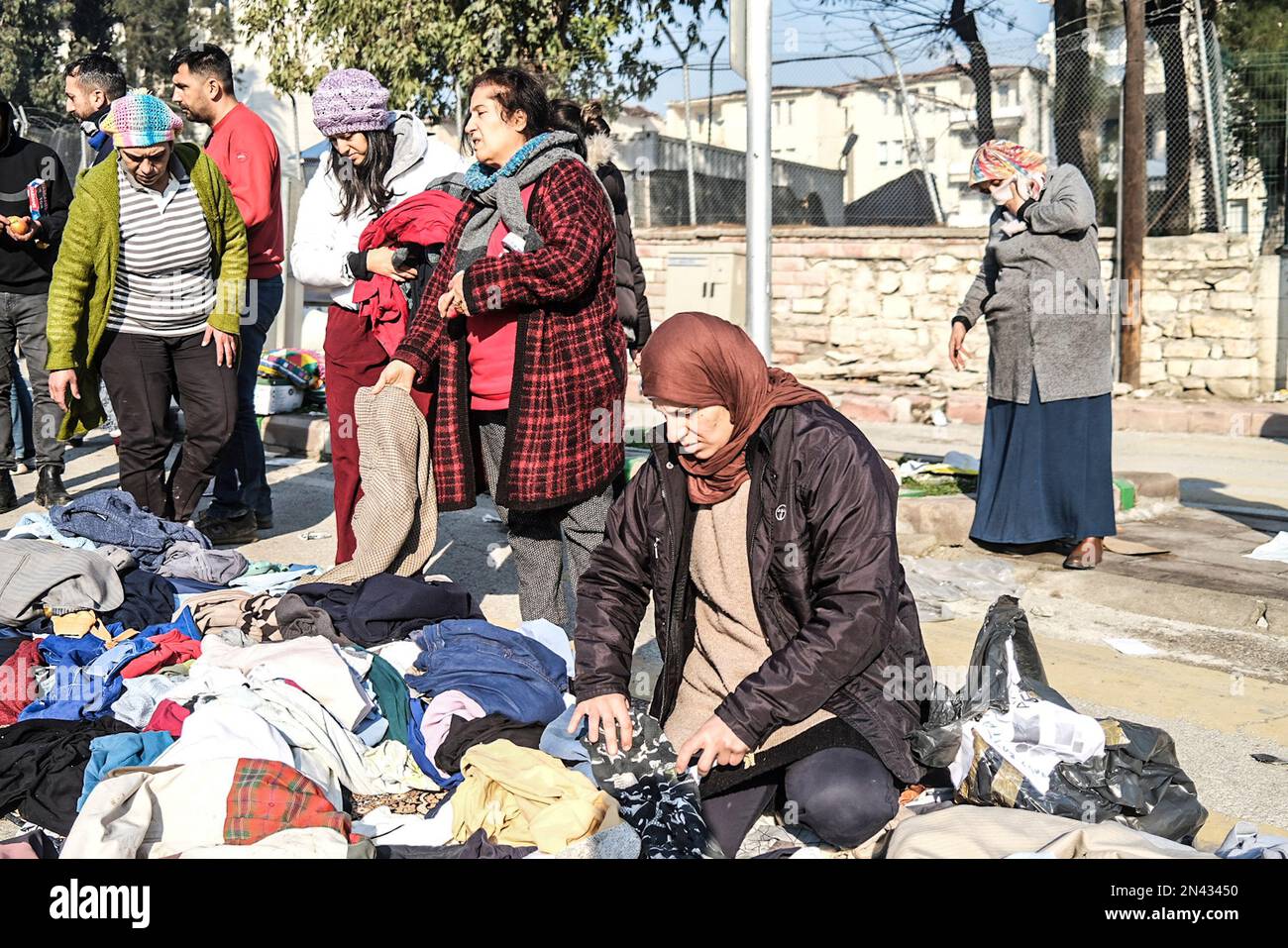 Hatay, Turkey. 08th Feb, 2023. Earthquake victims choose clothes from ...