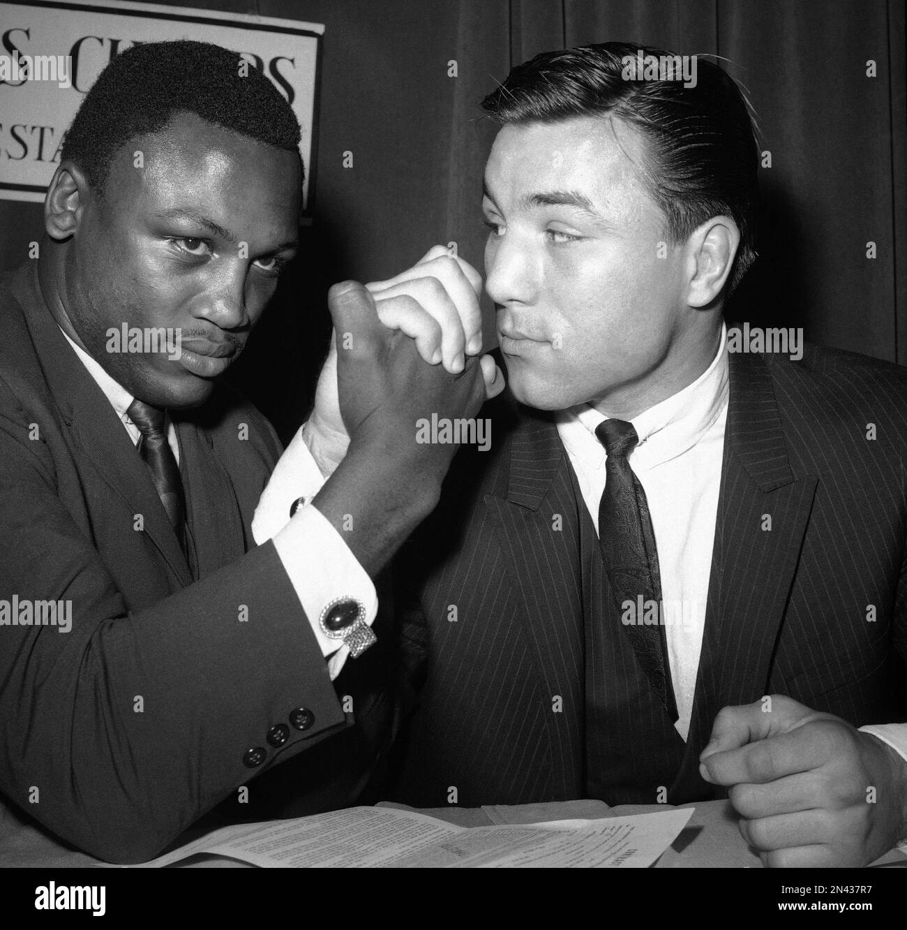 FILE - In this June 13, 1967, file photo, Joe Frazier, left, and George ...