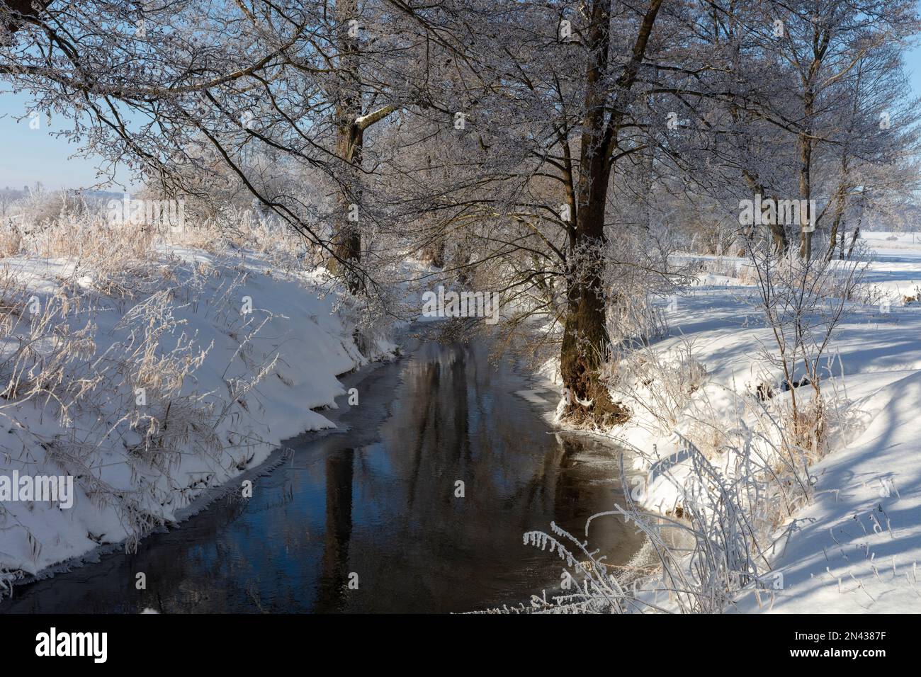Warmia and Masuria, river in winter scenery, Poland Stock Photo - Alamy