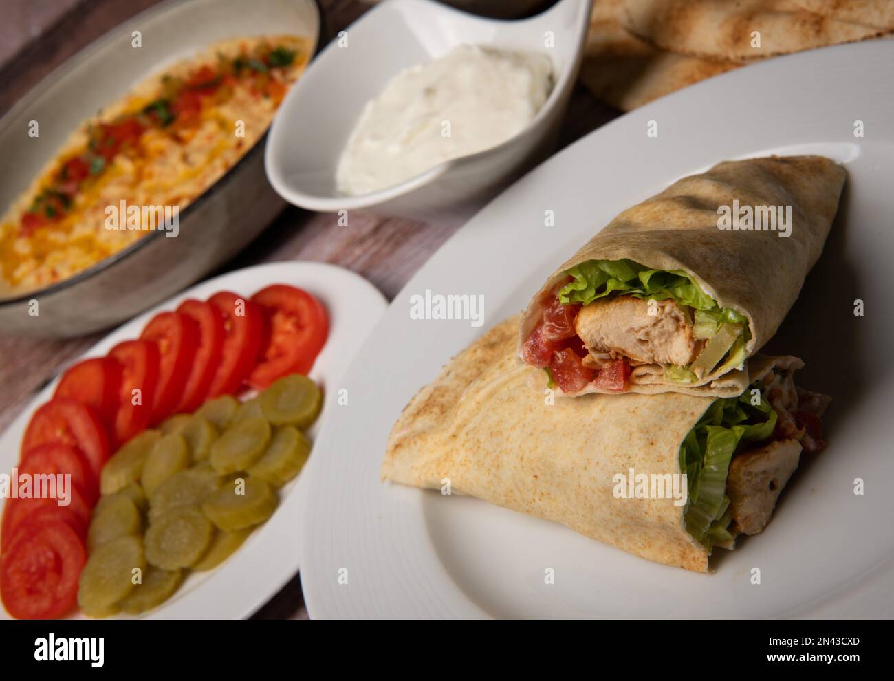 Lebanese recipe of chich taouk, garlic cream, toum, in a Lebanese bread ...