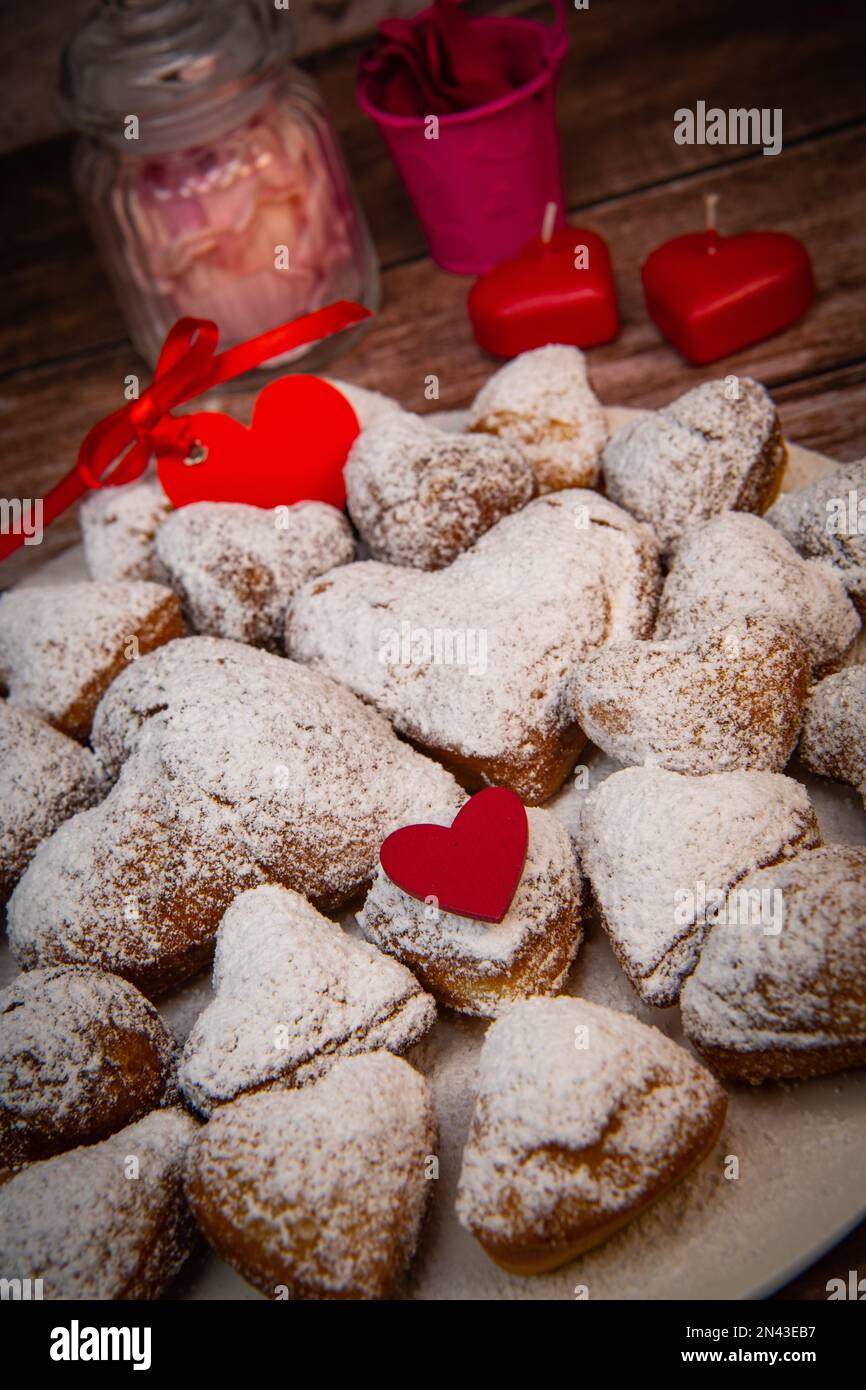 Recipe for soft heart-shaped doughnuts for Valentine's Day Stock Photo ...