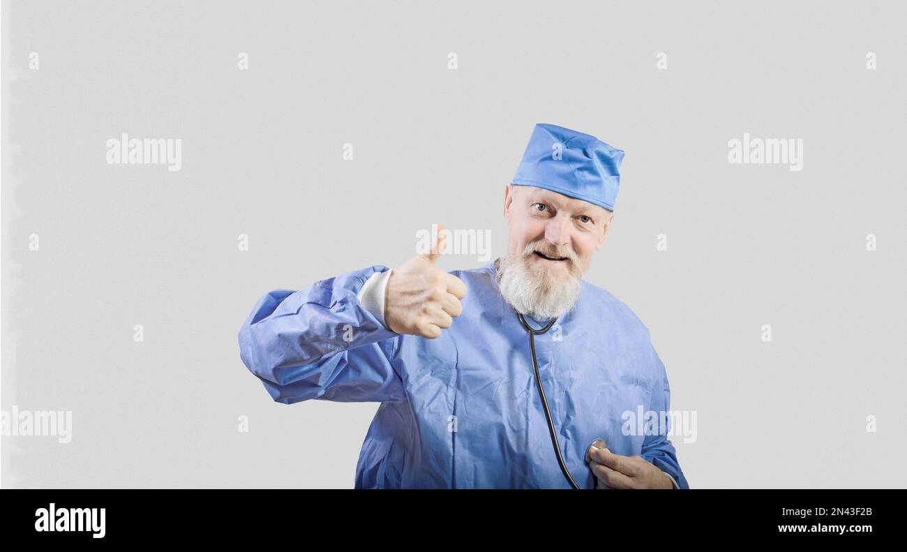 Infectious disease doctor with a gray beard in a blue protective ...