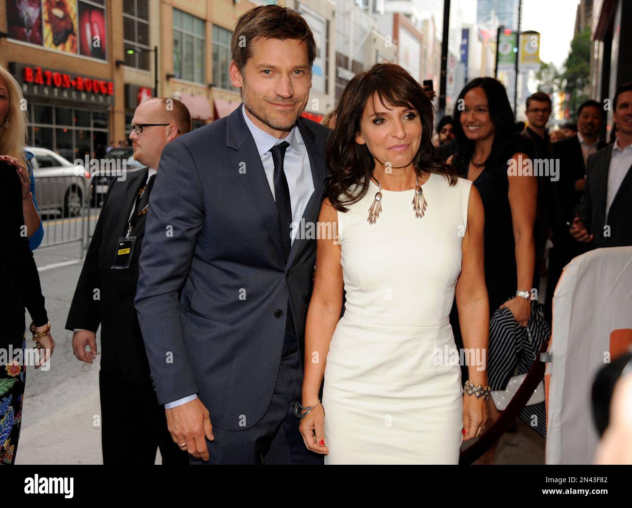 Nikolaj Coster-Waldau, left, and Susanne Bier attend the premiere of "A ...