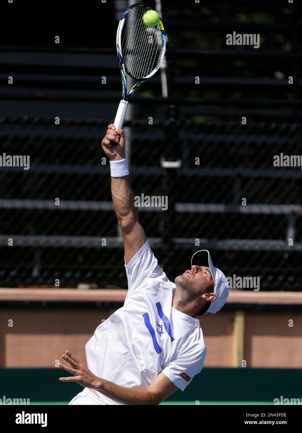 Jonathan Erlich, of Israel, serves during practice at the Sunrise ...