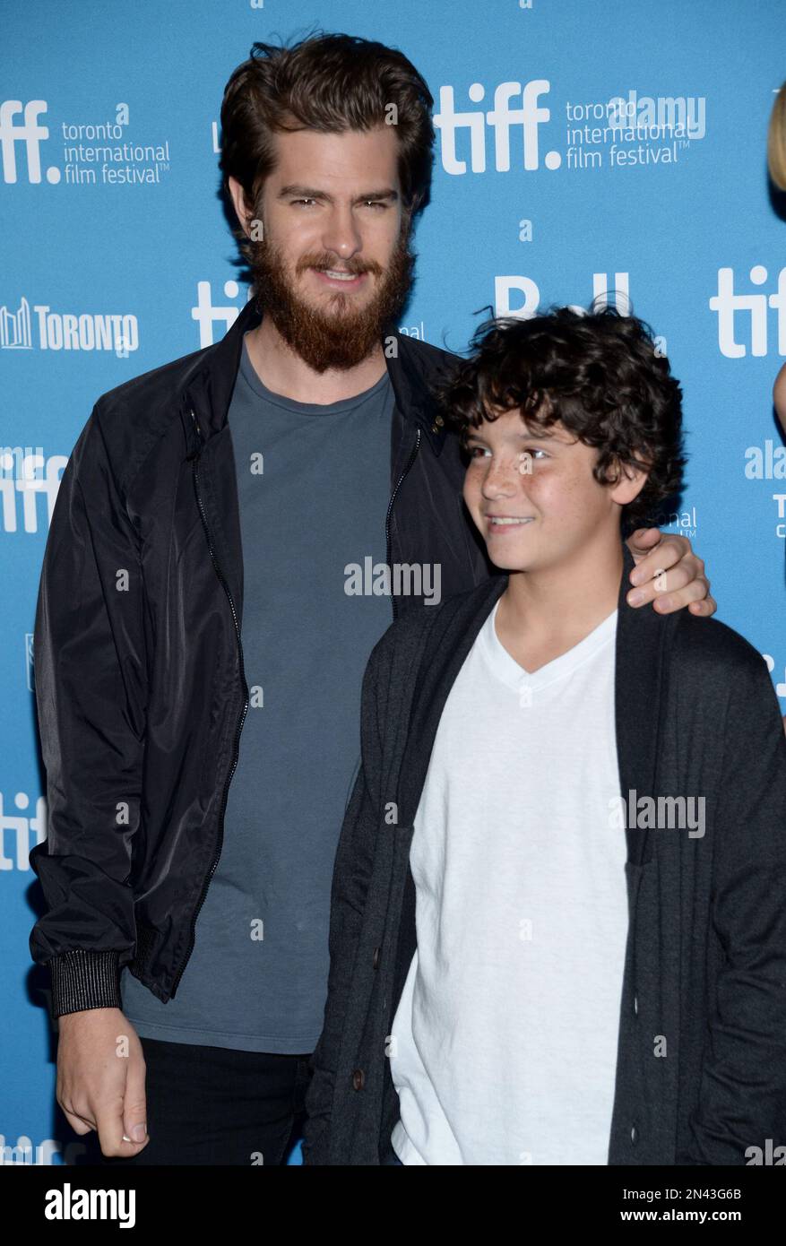 Andrew Garfield, left, and Noah Lomax attend the press conference for ...