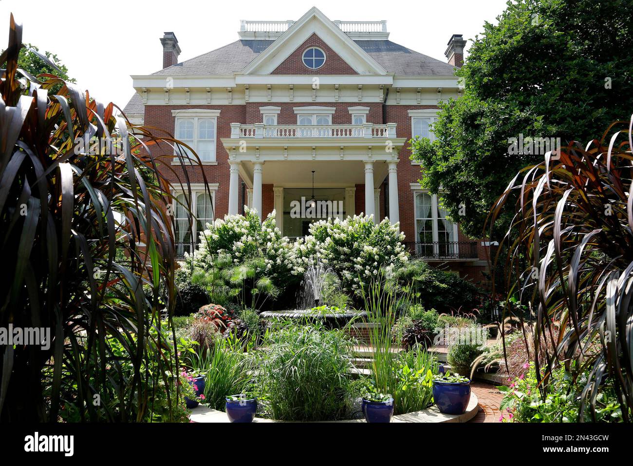 This Aug. 28, 2014 photo shows a fountain in the front garden of the ...