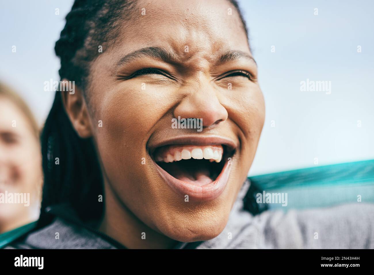 Sports, cheer and excited black woman in stadium shouting, cheering and ...