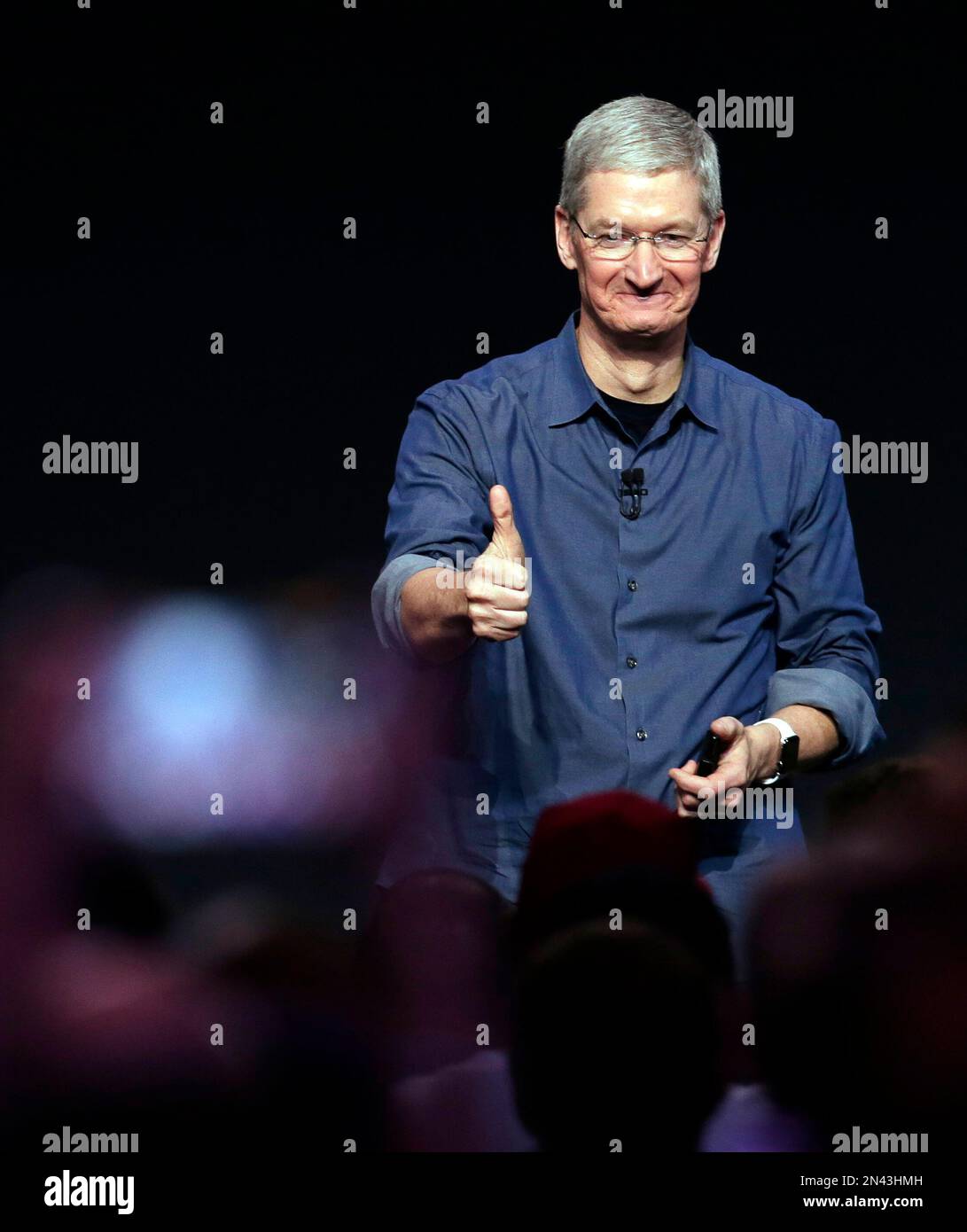 Apple CEO Tim Cook introduces the new Apple Watch, which he is wearing ...