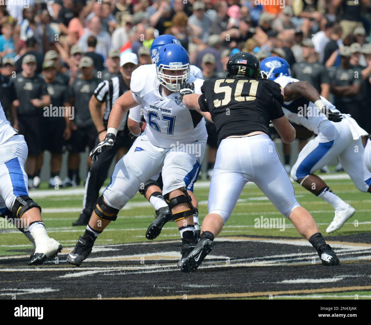 Buffalo offensive linesman Jake Silas (67) defends against Army ...