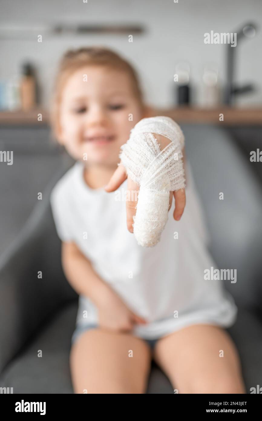 Little girl with broken finger at the doctor's appointment in the ...