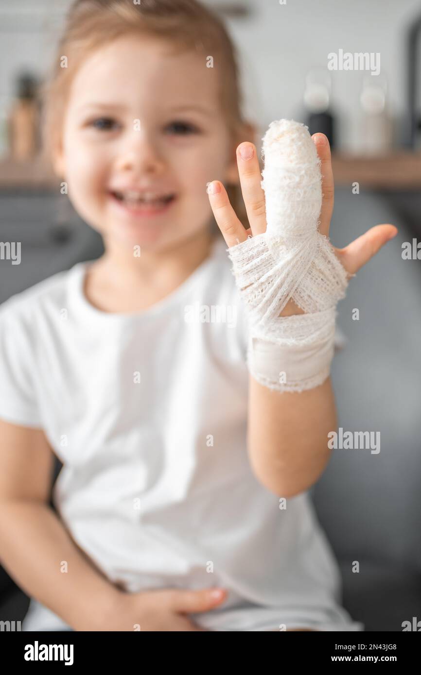 Little girl with broken finger at the doctor's appointment in the ...