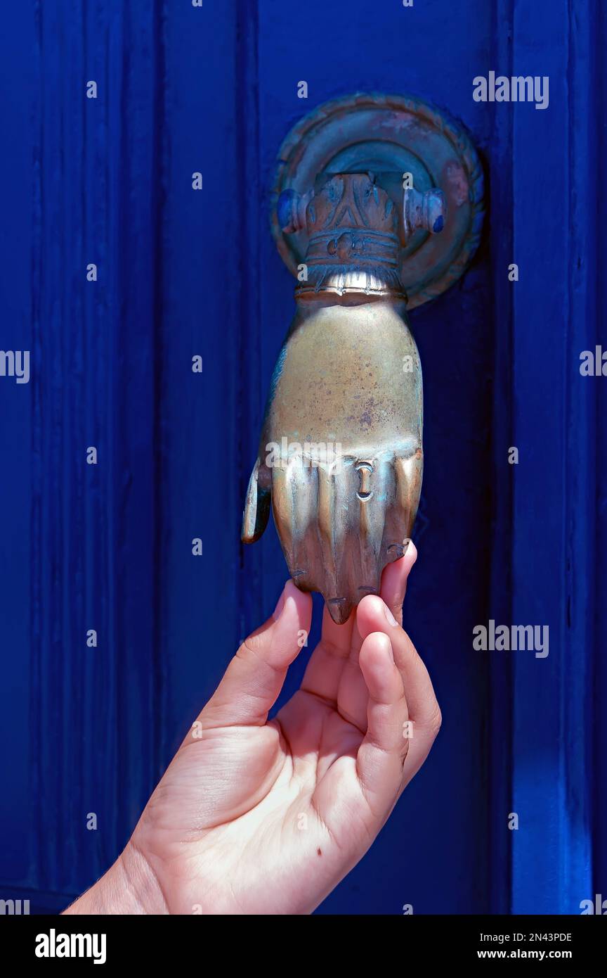 Head shaped blue door knob Stock Photo - Alamy