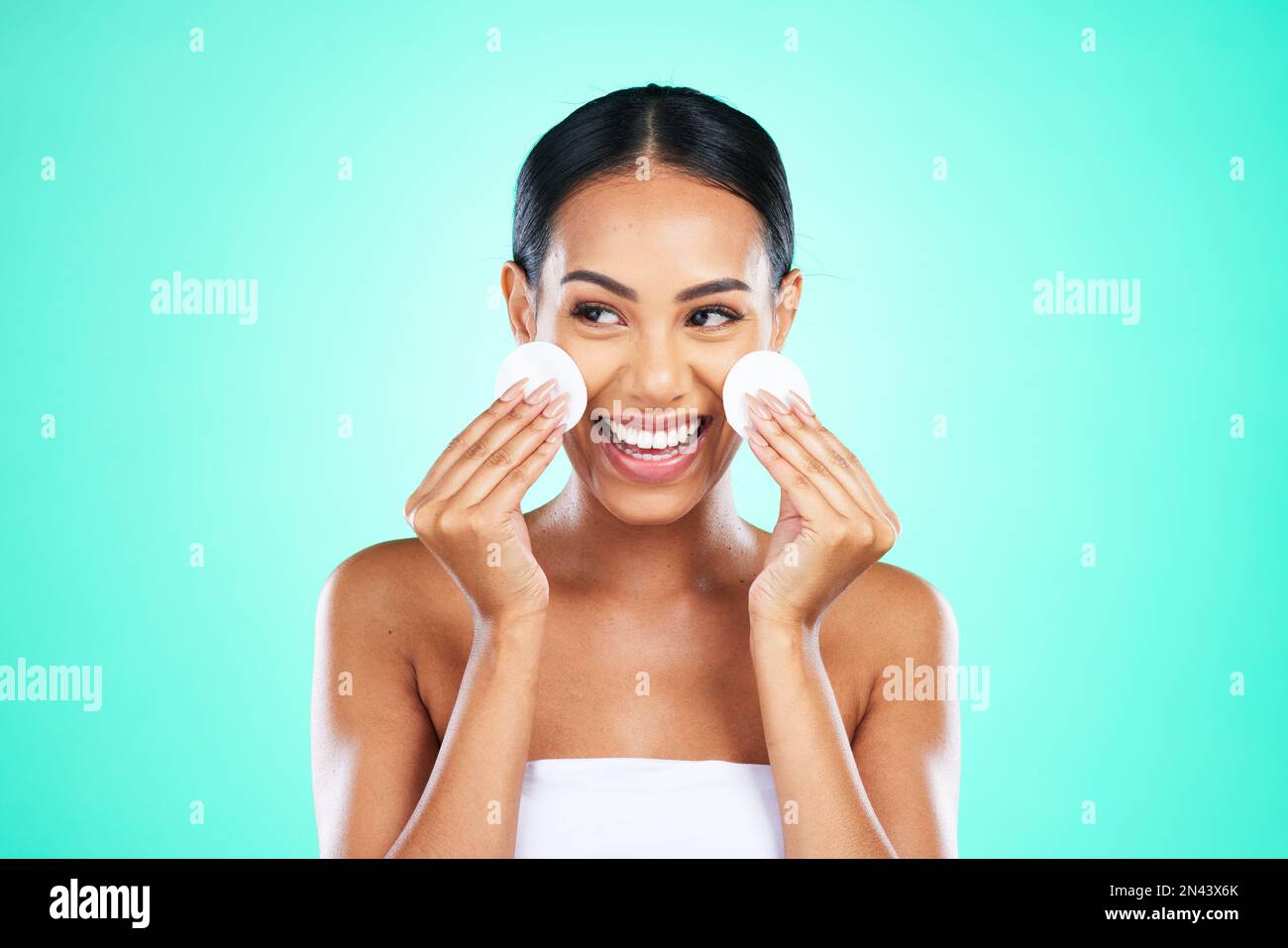 Beauty, happy and woman with cotton for skincare isolated on a green ...