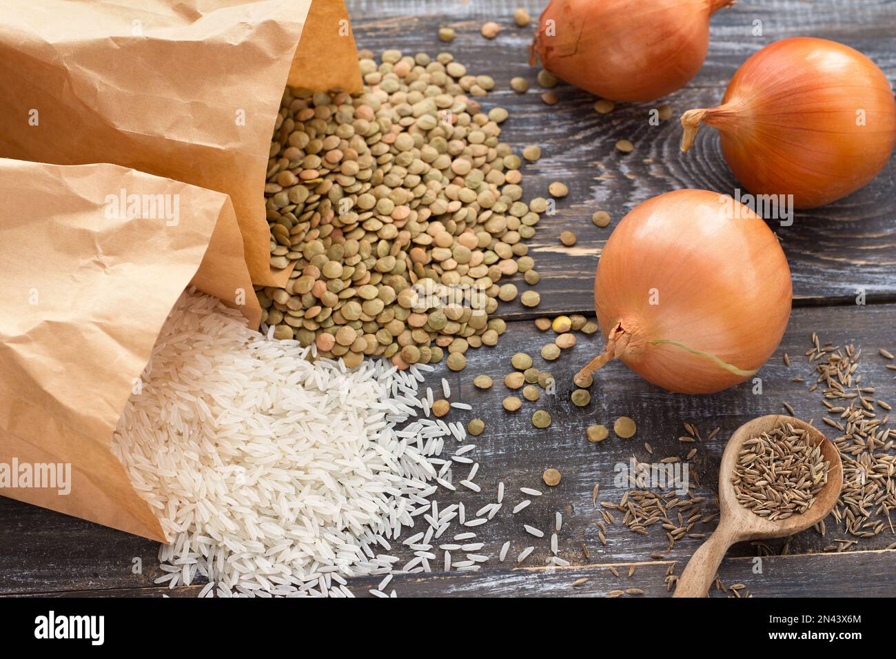 White rice, lentils, onions, zira or cumin - ingredients for ...