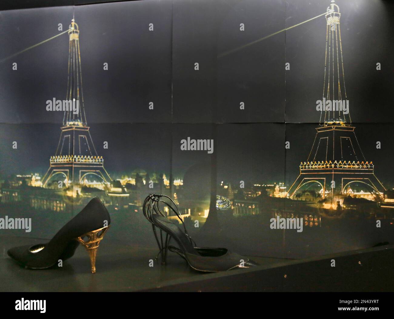 In this Sept. 4, 2014 photo, an Eiffel tower background illuminates the ...