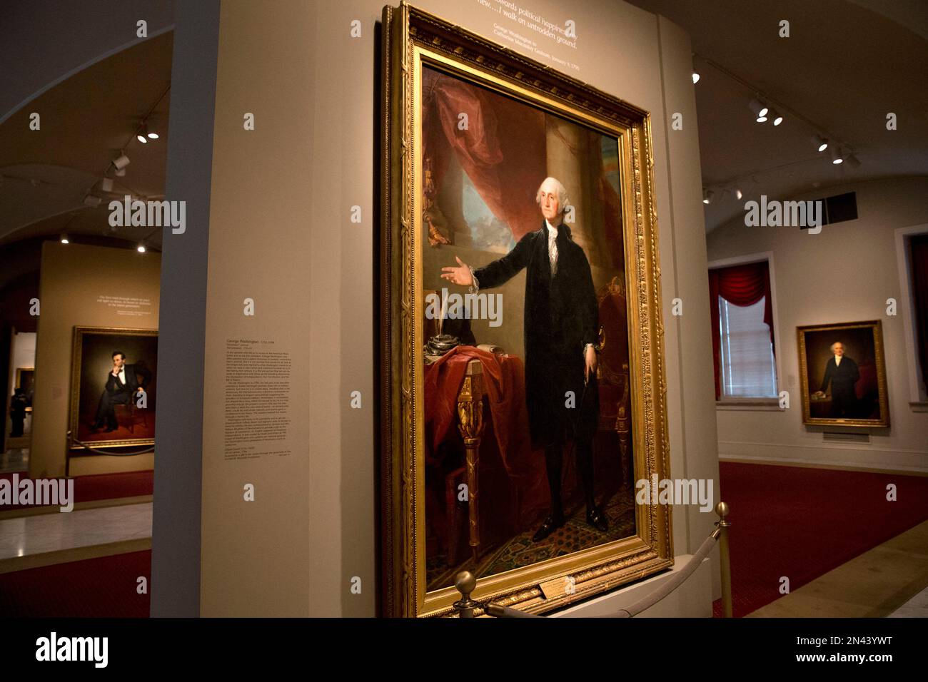 This photo taken Aug. 27, 2014 shows presidential portraits, including ...