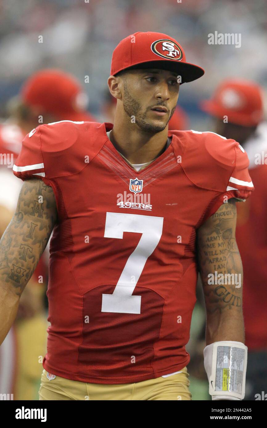 San Francisco 49ers quarterback Colin Kaepernick (7) walks the ...
