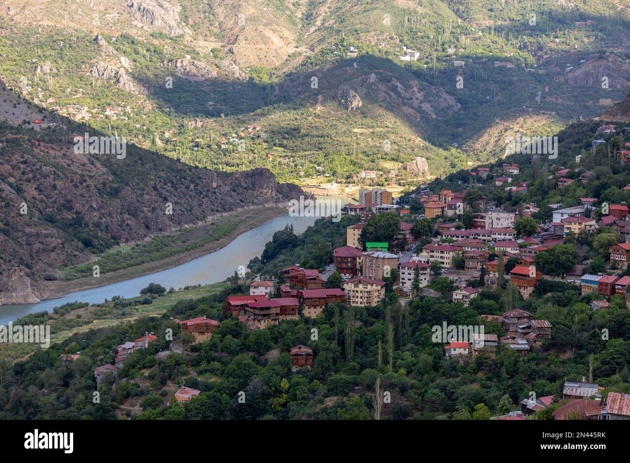 Valley view of Kemaliye town. View of the old Kemaliye houses and the ...