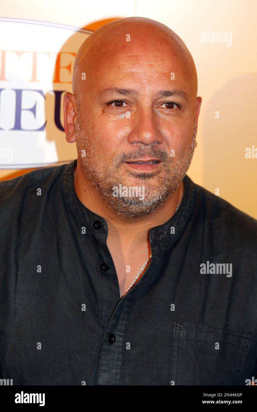 French chef Frederic Anton poses for photographers during a photocall ...