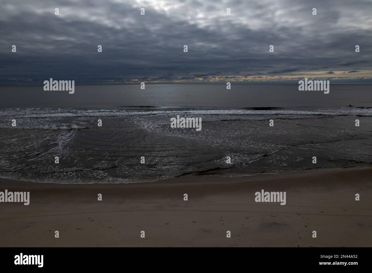 An aerial view of sea waves breaking beach Stock Photo - Alamy