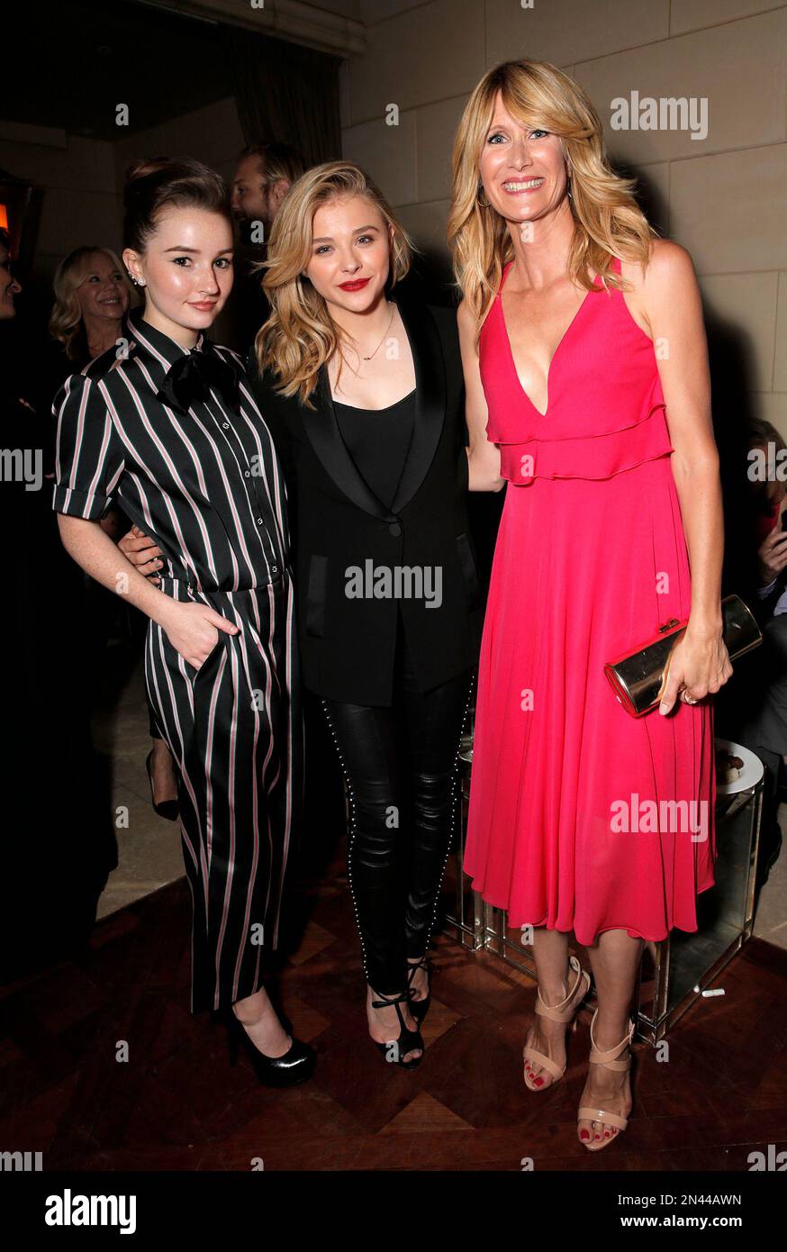 Kaitlyn Dever, and from left, Chloe Grace Moretz and Laura Dern attend ...