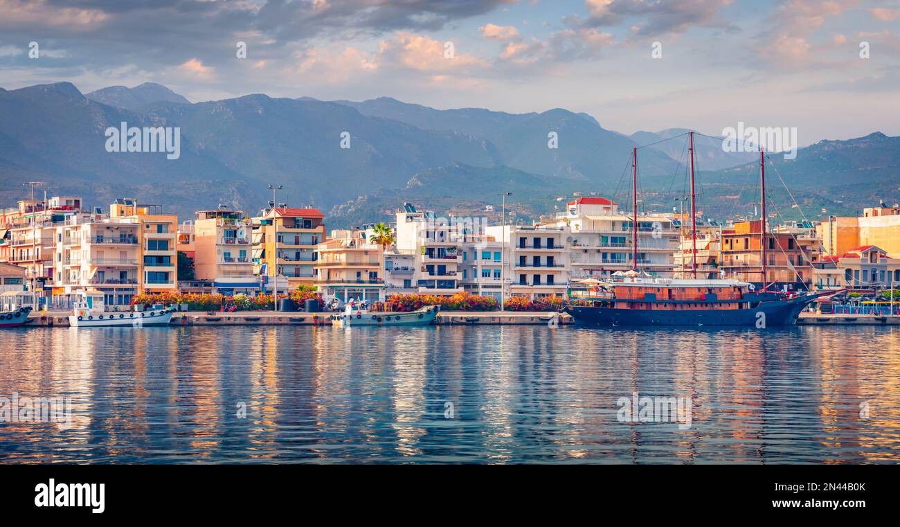 Sunny morning cityscape of Kalamata port with old vessel. Magnificent ...
