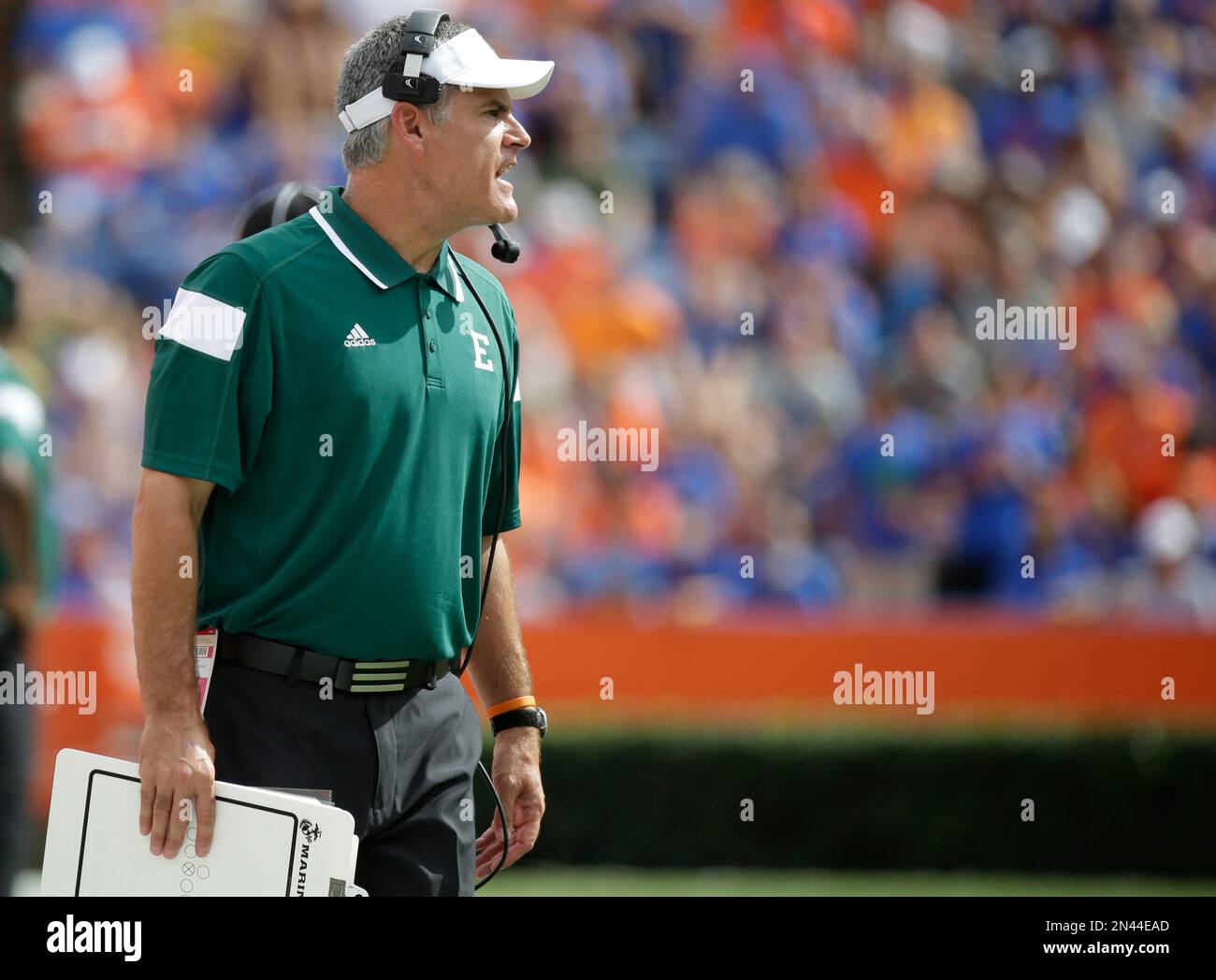 Eastern Michigan head coach Chris Creighton shouts out to his players ...