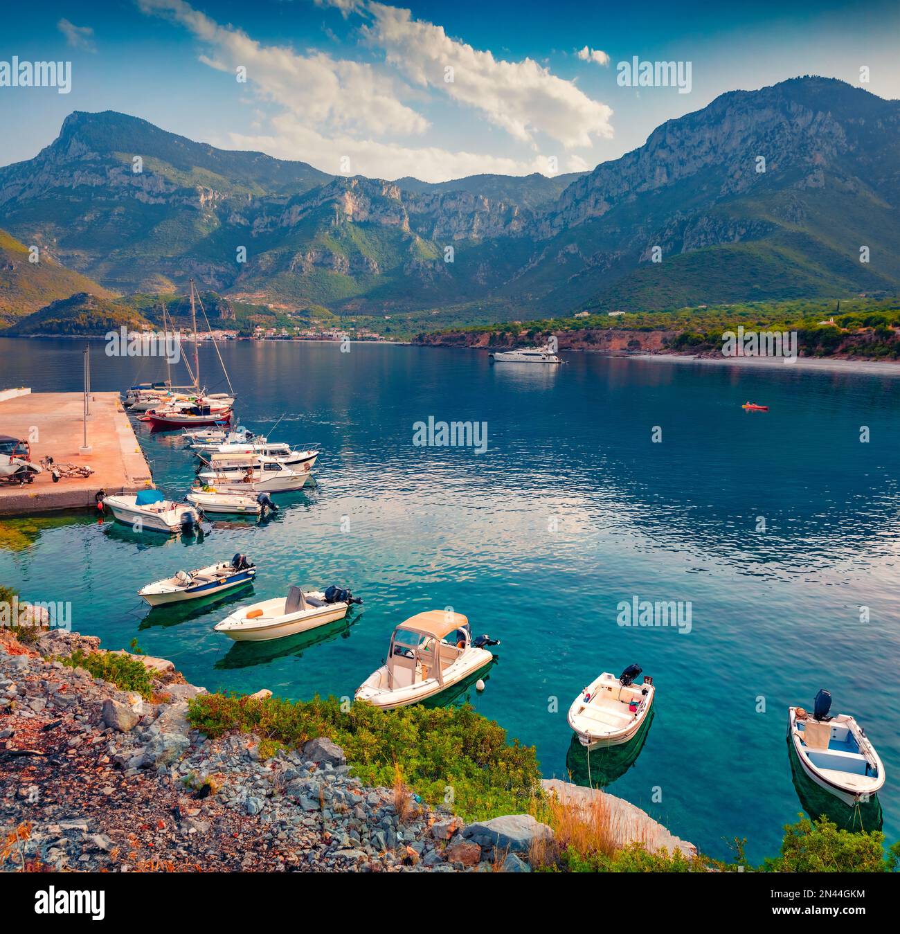 Wonderful summer view of Logari port with small fishing boat and ...